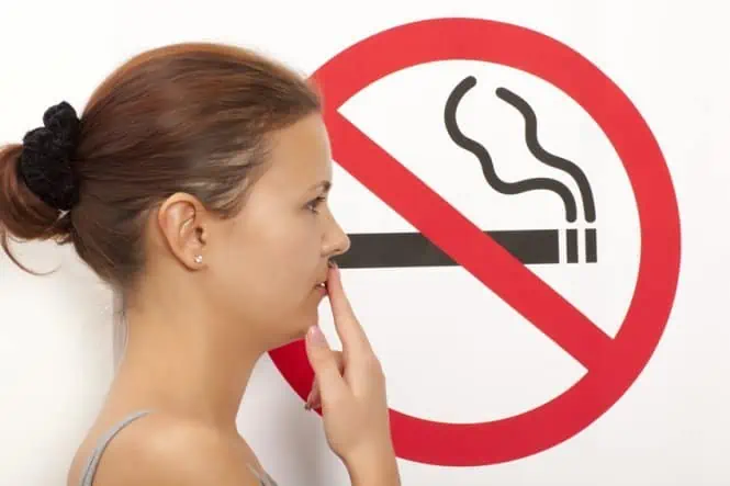 Smoking After Tooth Extraction: How Long Do I Have to Wait? - Dentaly.org